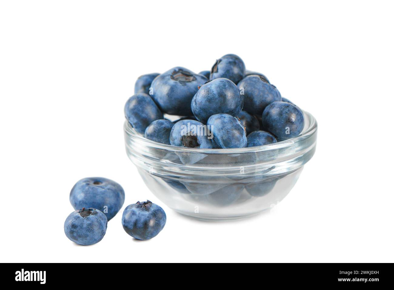 Fresh blueberries in small transparent bowl isolated on white ...