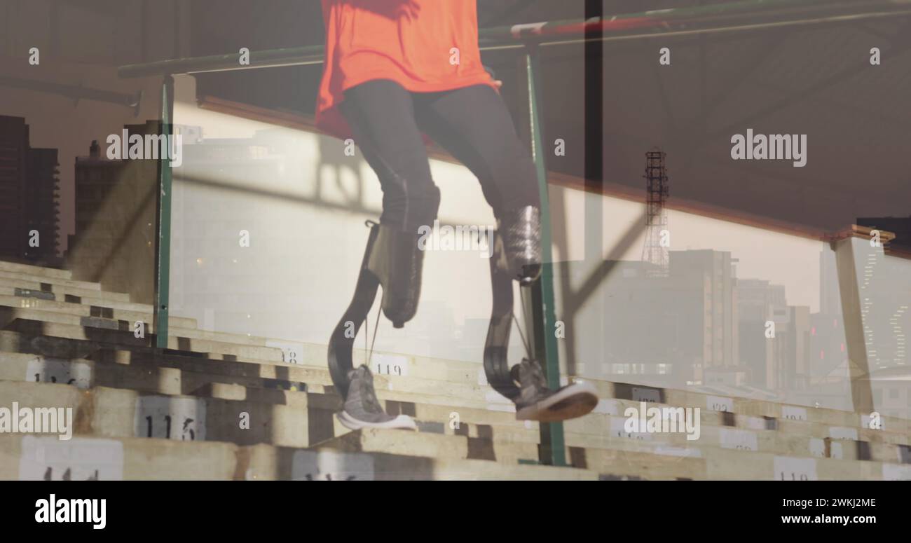 Image of cityscape over disabled african american man with artificial ...