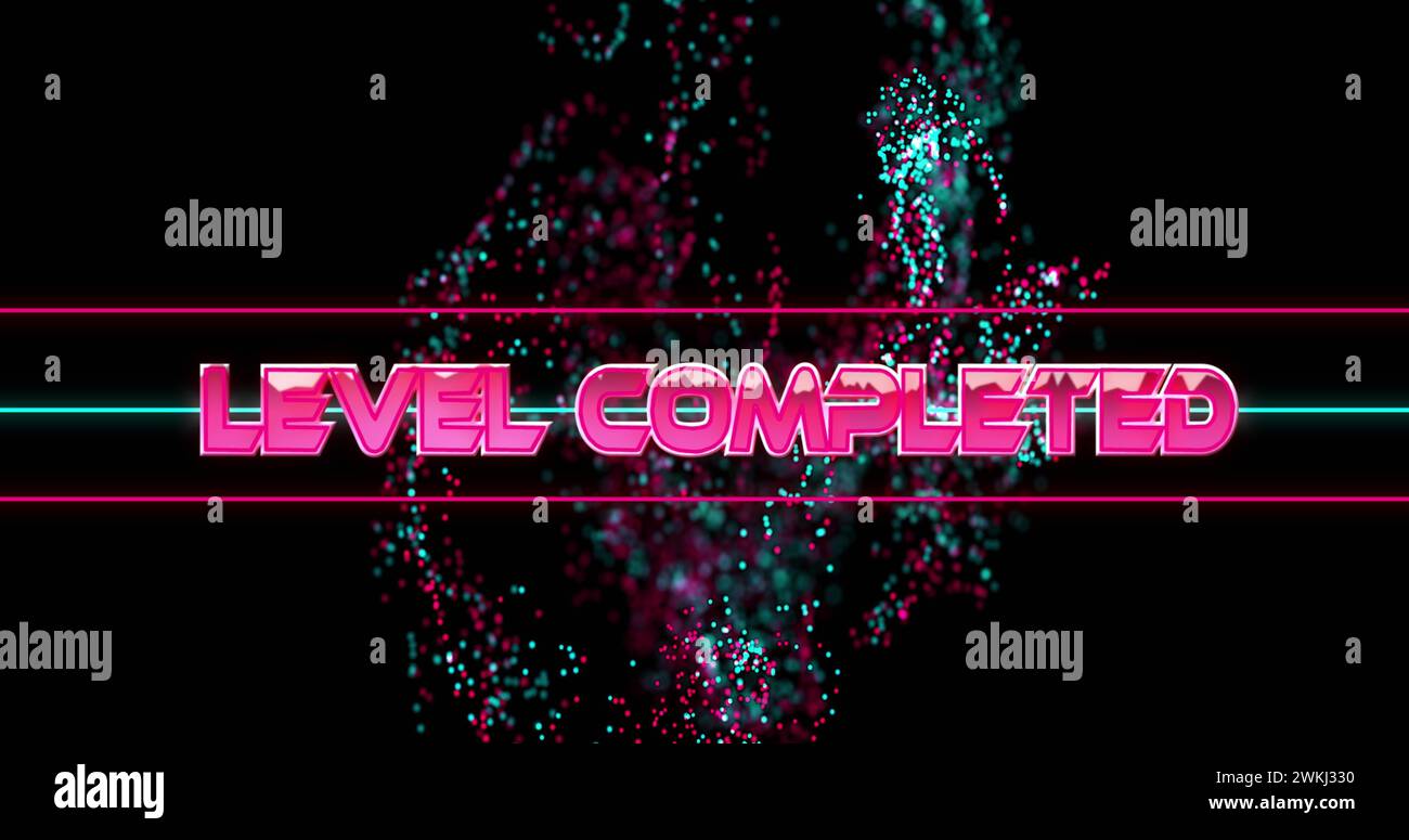 Image of level completed text over colorful fireworks Stock Photo - Alamy