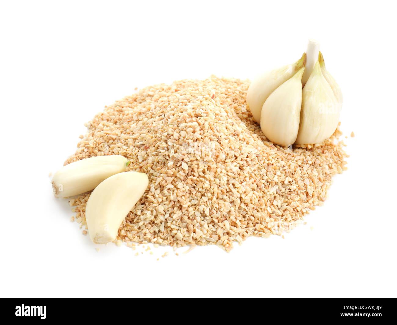 Heap of dehydrated garlic granules and peeled cloves isolated on white ...