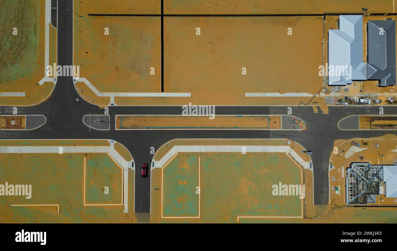 Aerial view of a construction site showing new homes under construction ...