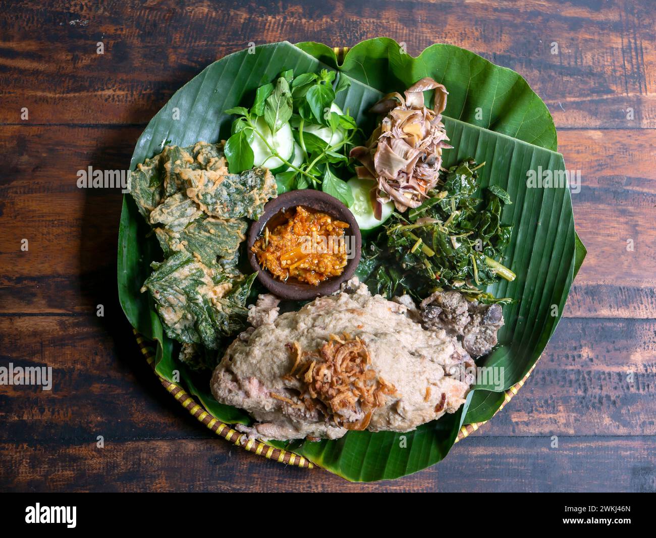 Ingkung Ayam, a traditional food from Yogyakarta, Indonesia, made from ...