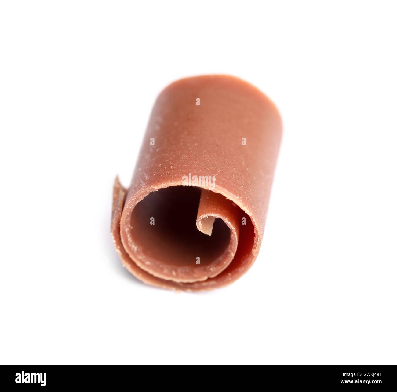 One tasty chocolate shaving isolated on white Stock Photo - Alamy