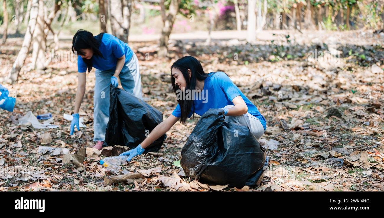 Group of volunteers, community members cleaning the nature from garbage ...