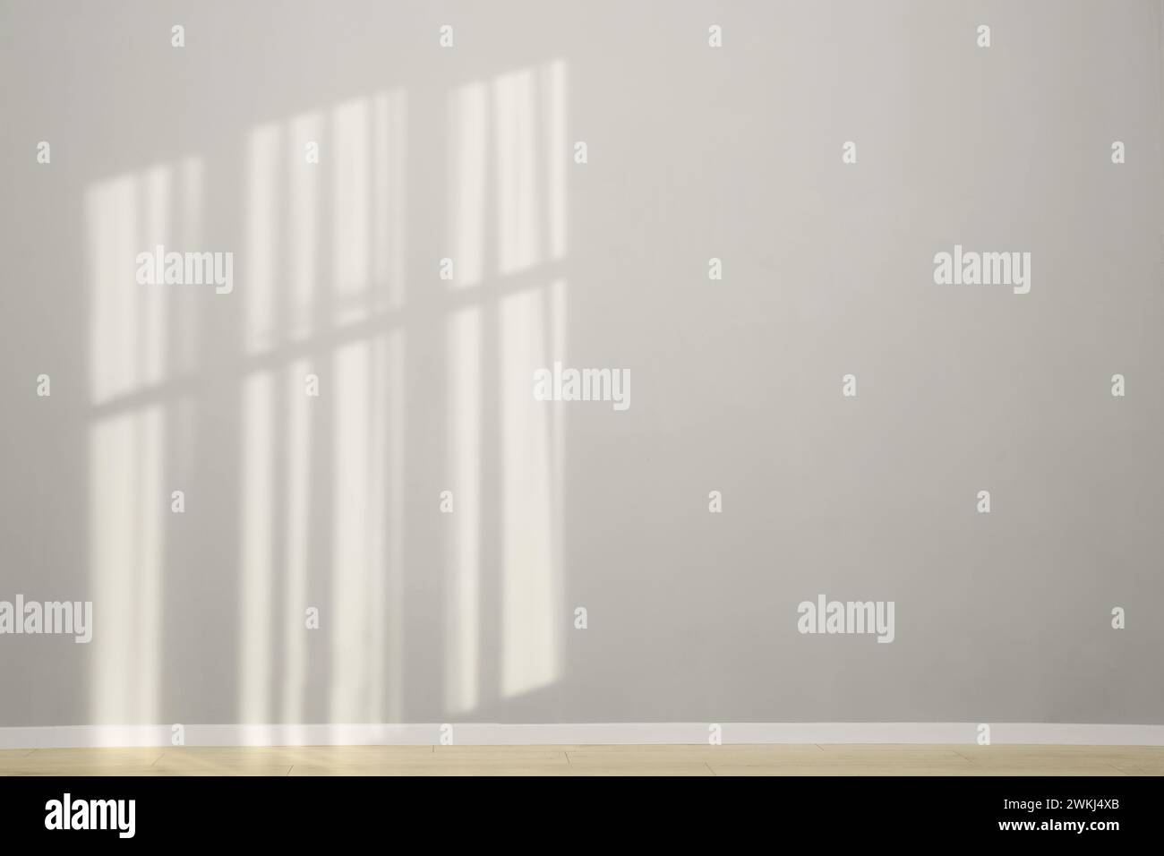 Light and shadows from window on wall indoors Stock Photo - Alamy