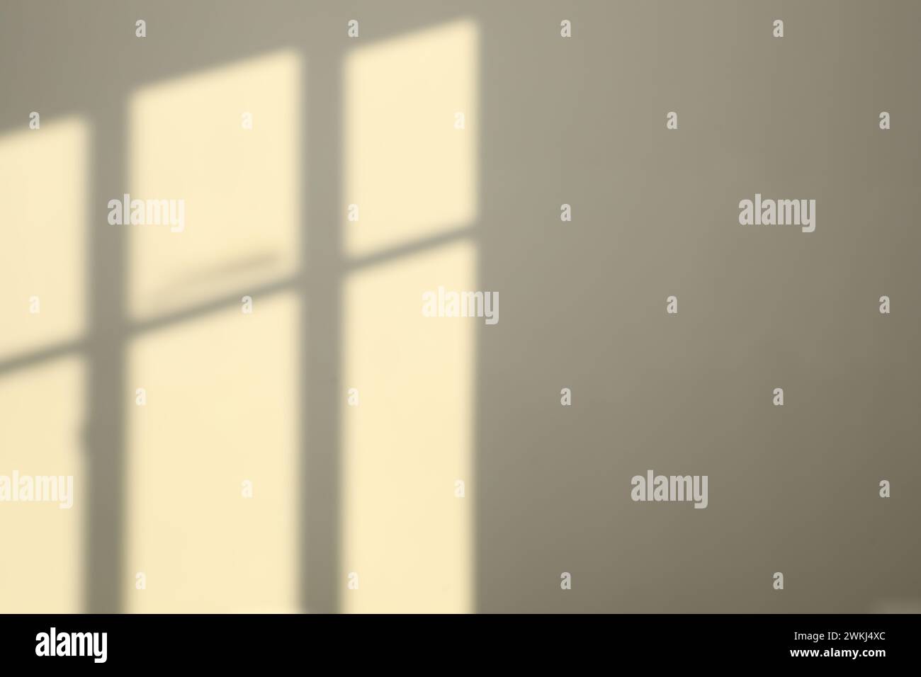 Light and shadows from window on wall indoors Stock Photo - Alamy