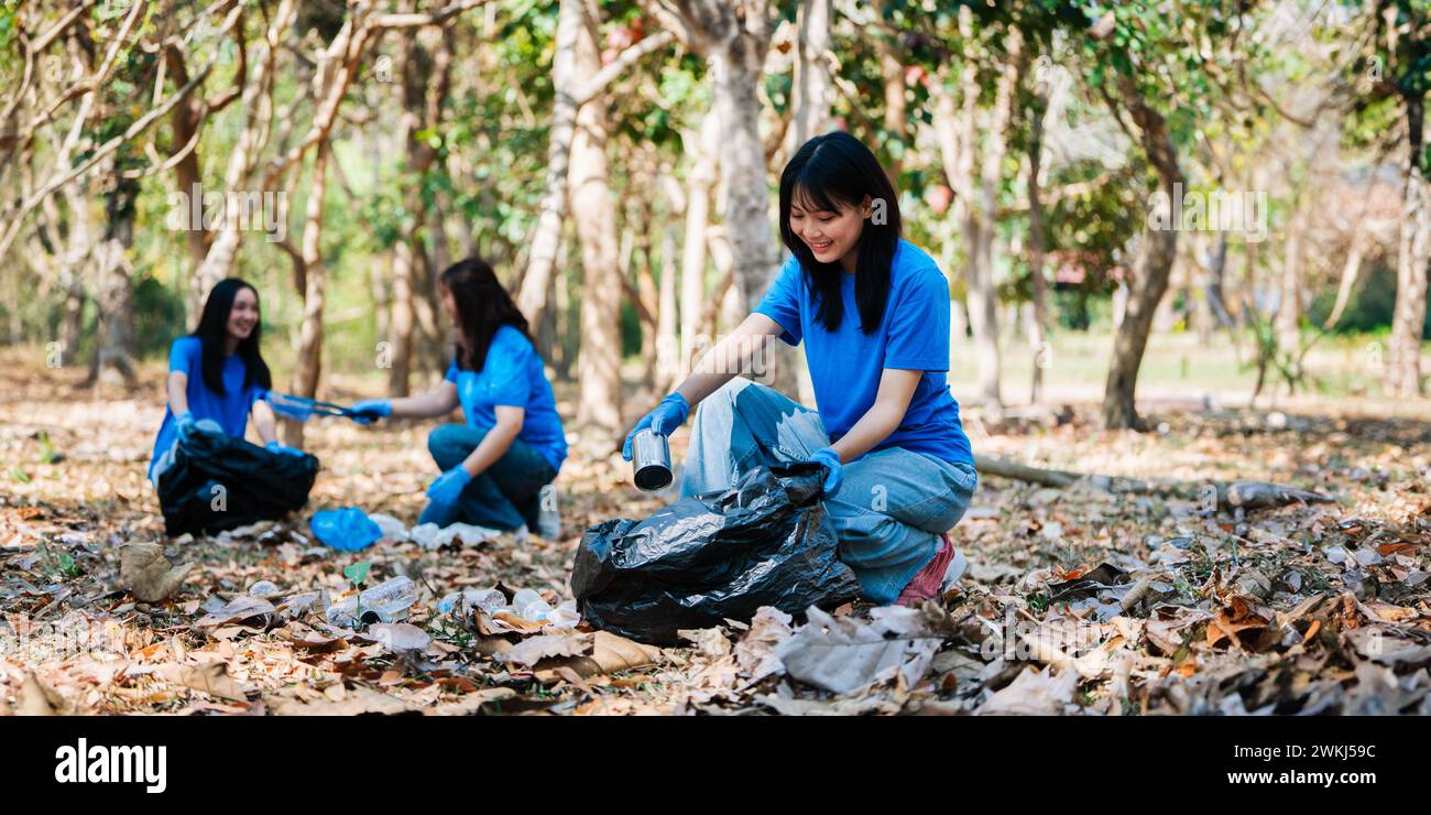 Group of volunteers, community members cleaning the nature from garbage ...