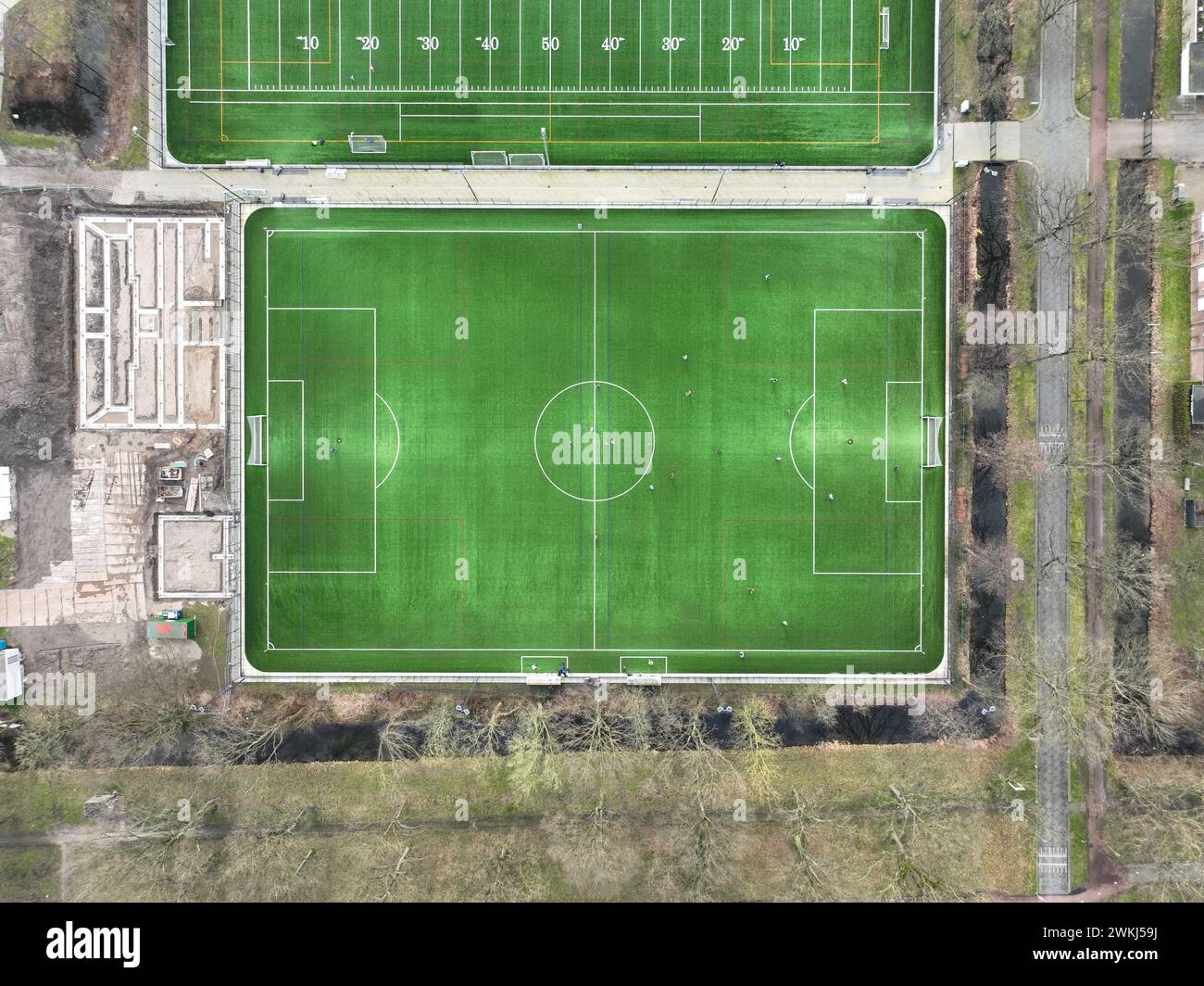 Soccer field form above, people playing sports, leisure and fitness ...