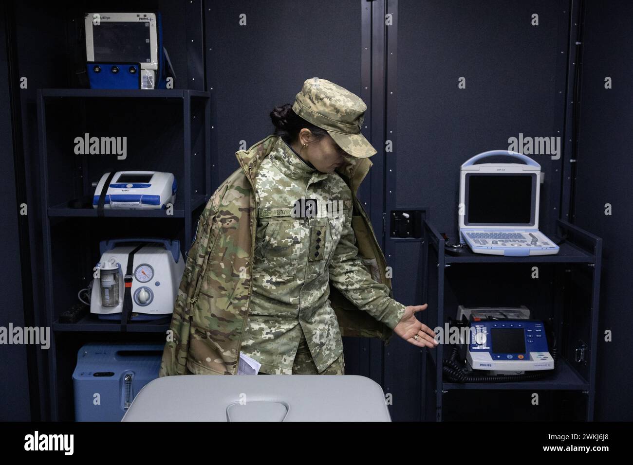 A military doctor shows reporters a new mobile stabilization center for ...