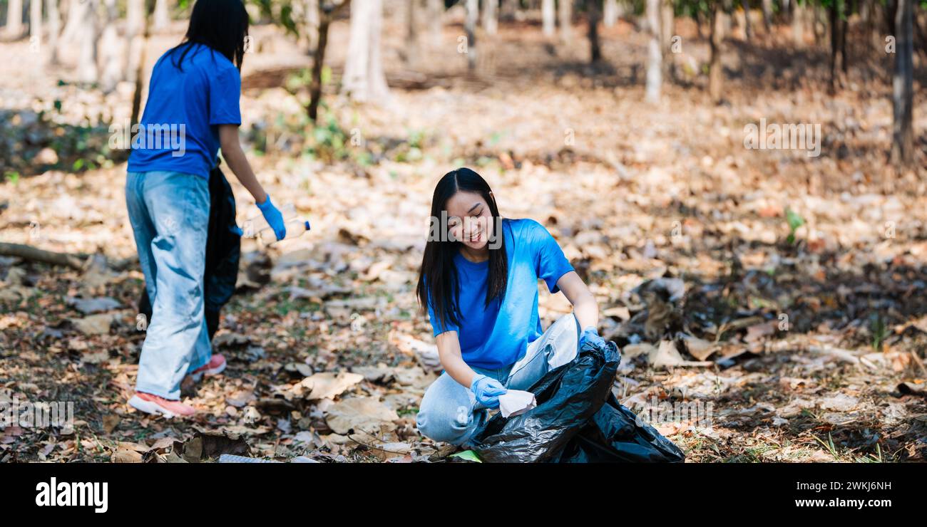 Group of volunteers, community members cleaning the nature from garbage ...