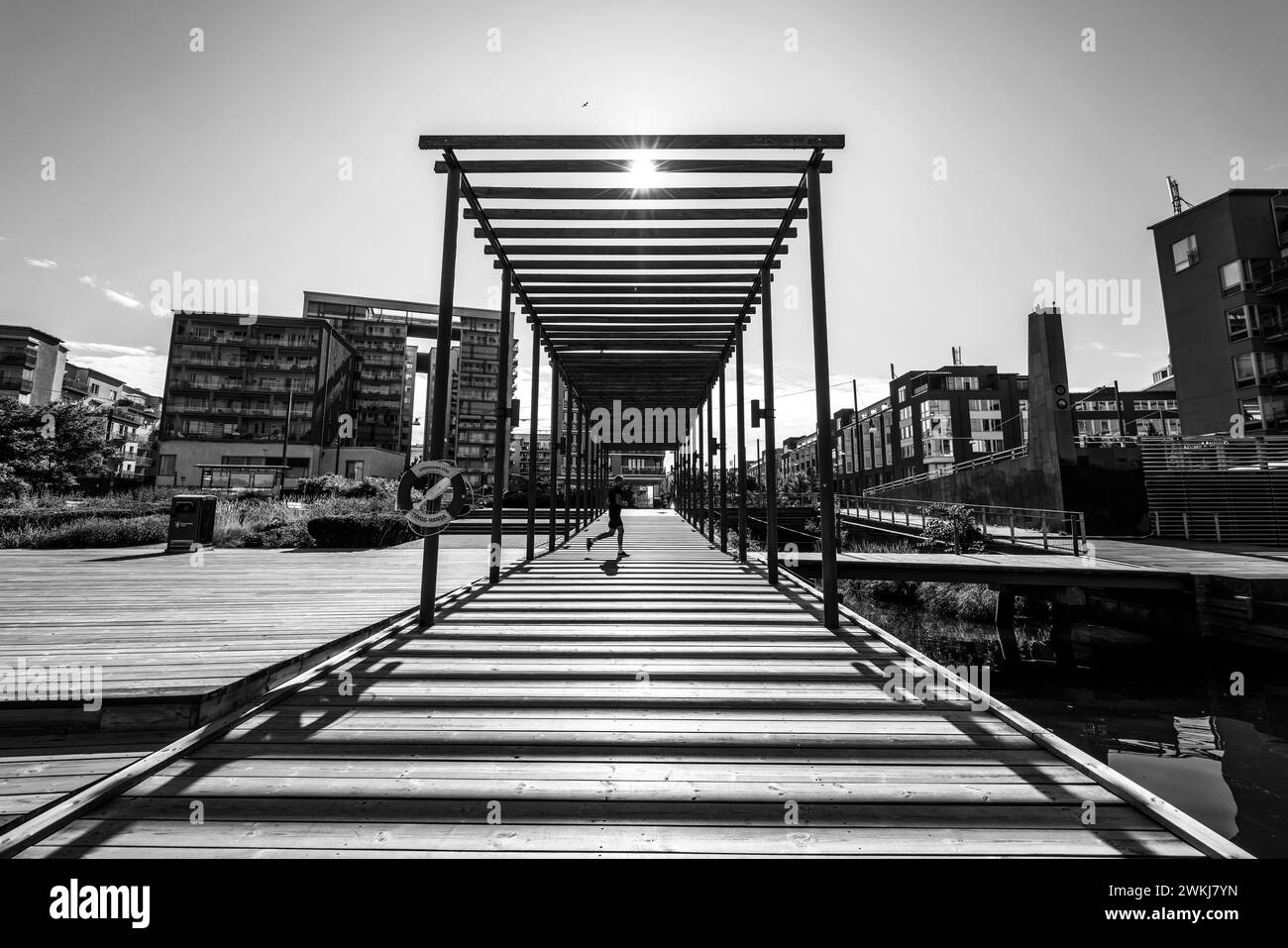 Runner jogging on promenade hi-res stock photography and images - Alamy