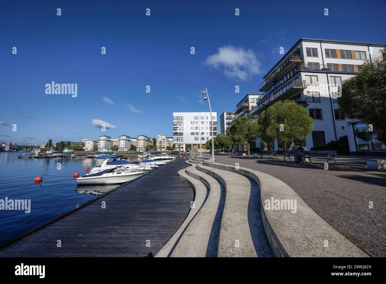 Boats in Henriksdalshamnen (Henriksdal harbour), cafes, apartments in ...