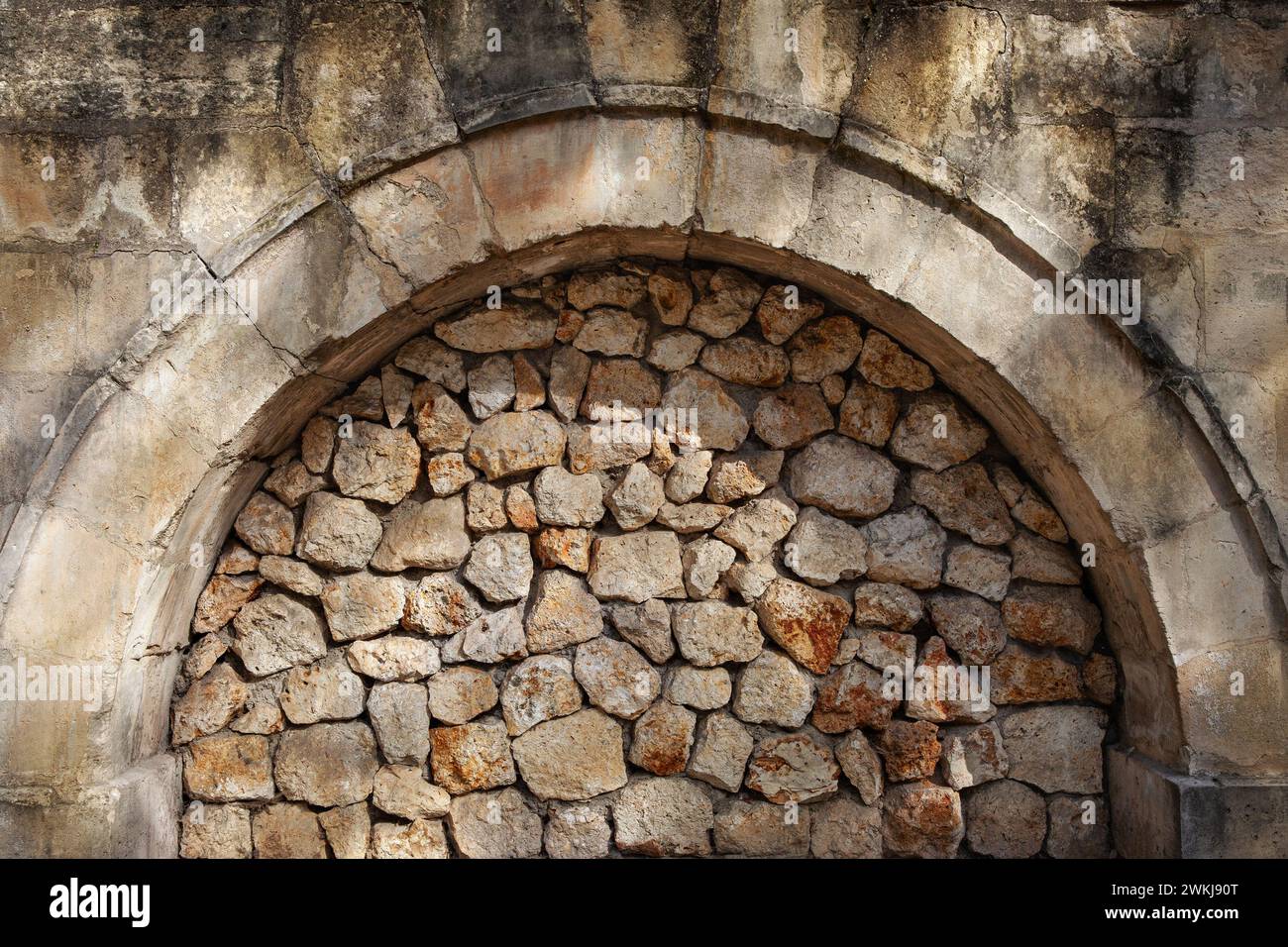 Pile of stones embedded in a vault Stock Photo - Alamy