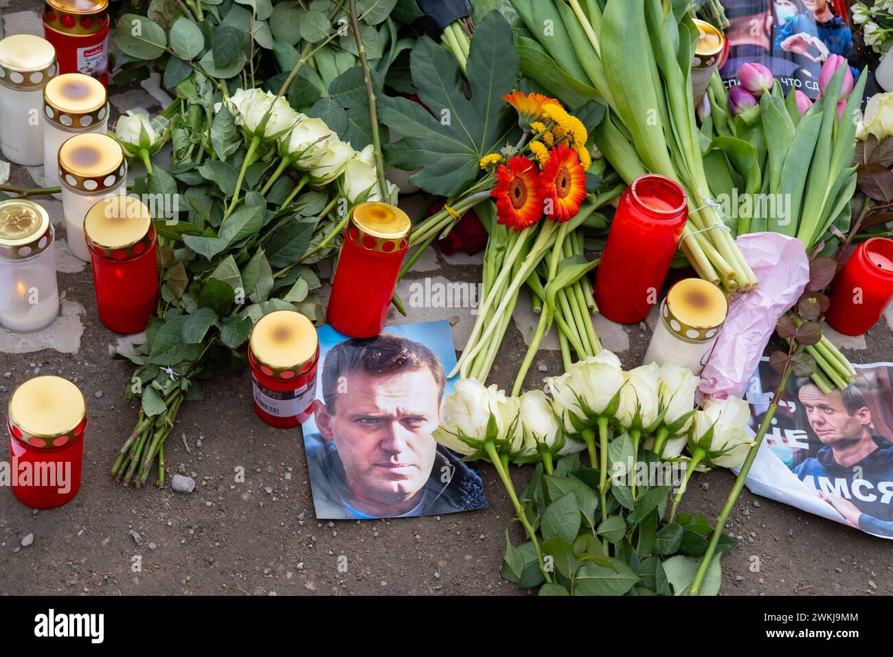 navalny memorial, flowers lie on ground, mourning candles burning after ...
