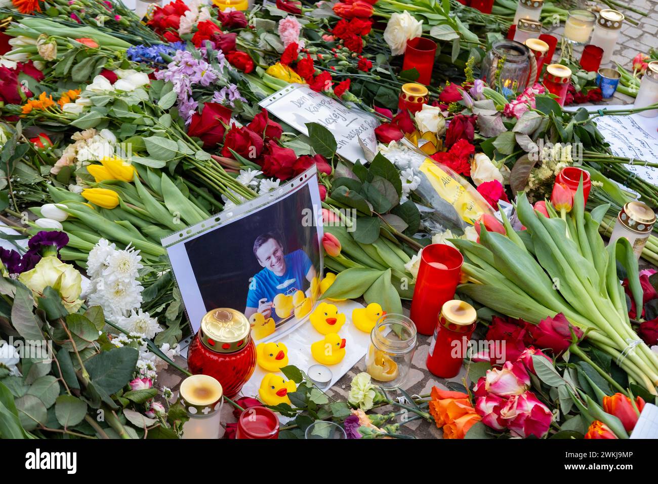 navalny memorial, flowers lie on ground, mourning candles burning after ...