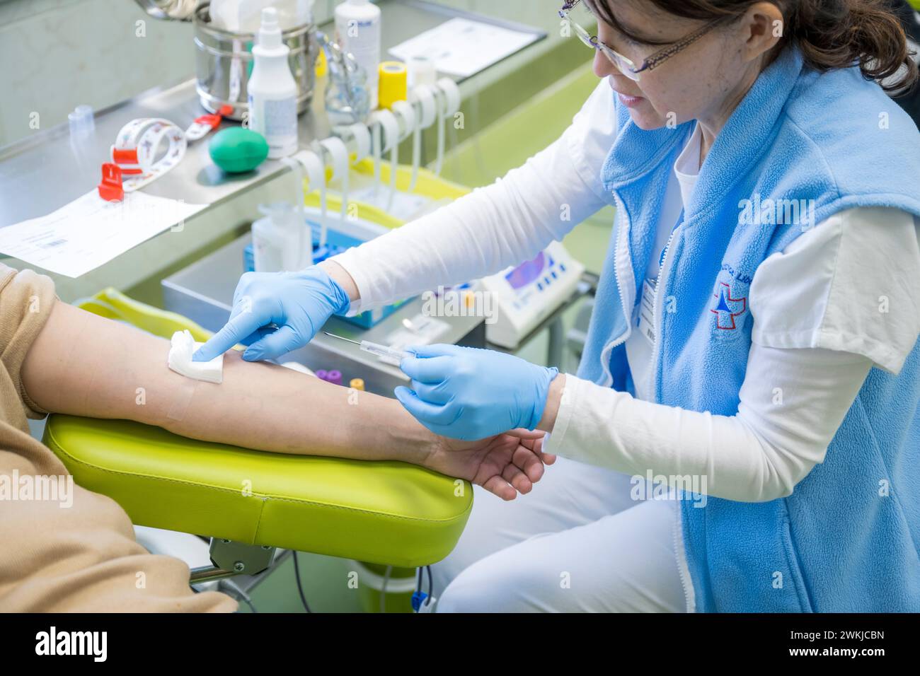 Liberec, Czech Republic. 21st Feb, 2024. A blood donor lies on a blood ...