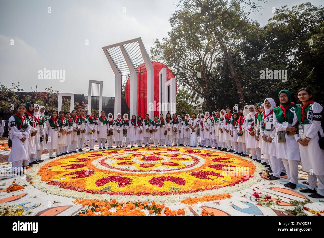 Dhaka, Bangladesh. 21st Feb, 2024. Volunteers pay tribute during the ...