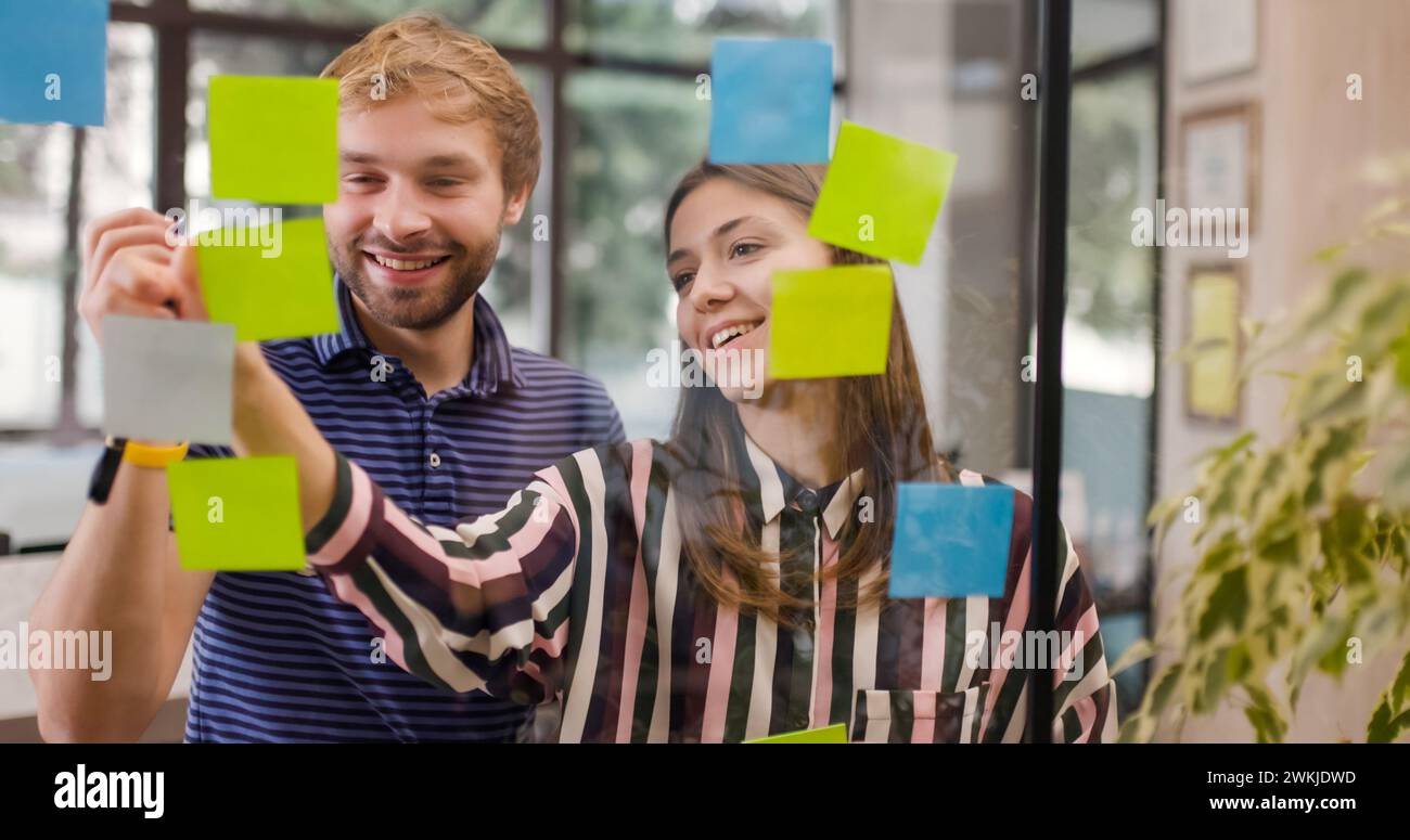 Two work colleagues organizing startup project ideas. Team of caucasian ...