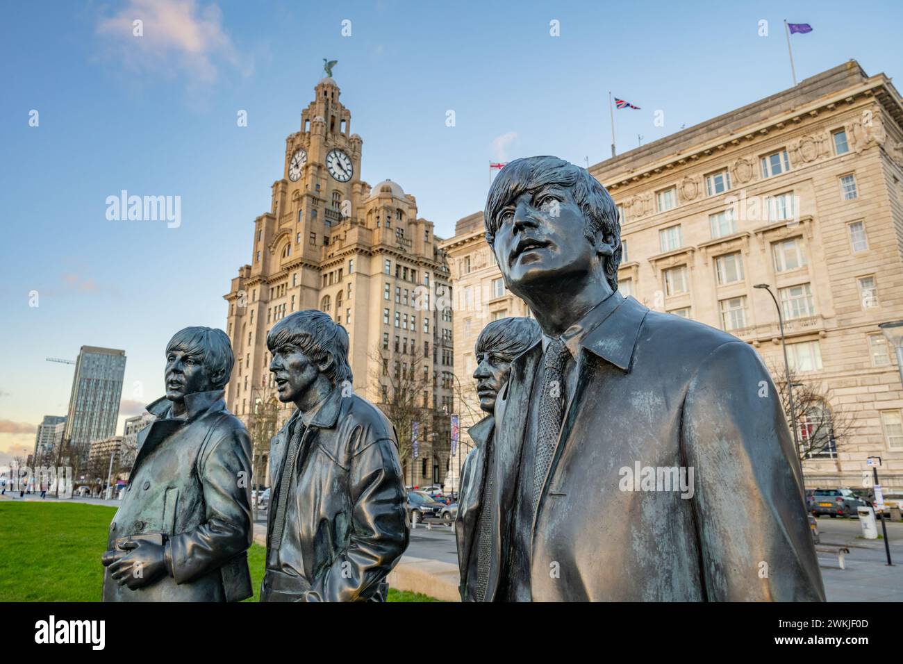The Beatles memorial at the Pier Head Liverpool Merseyside at sunset ...