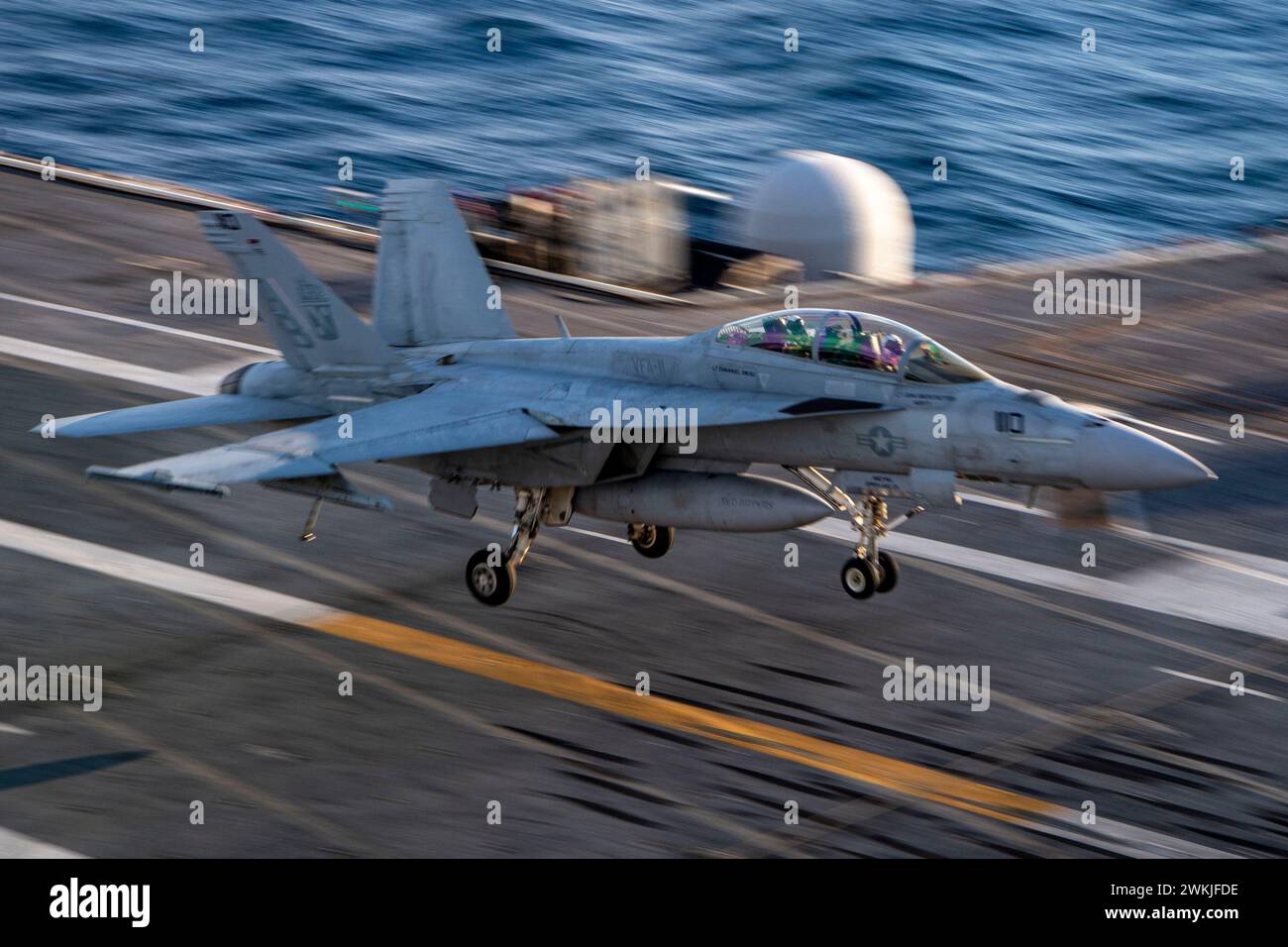A F/A-18E Super Hornet lands on the flight deck USS Harry S. Truman ...