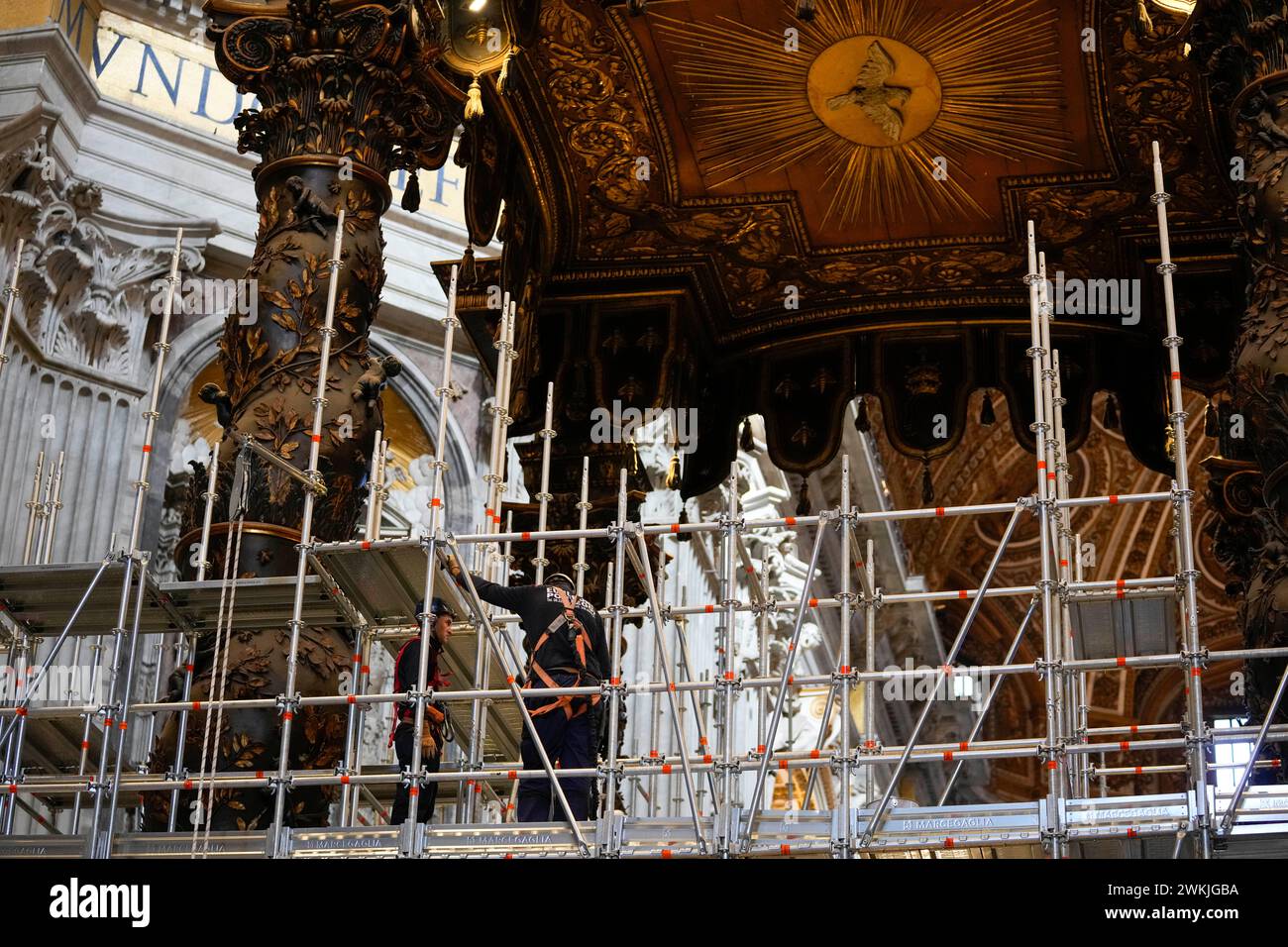Workmen mount scaffolding around the 17th century, 95ft-tall bronze ...