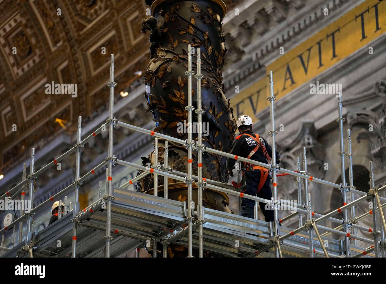 Workmen mount scaffolding around the 17th century, 95ft-tall bronze ...