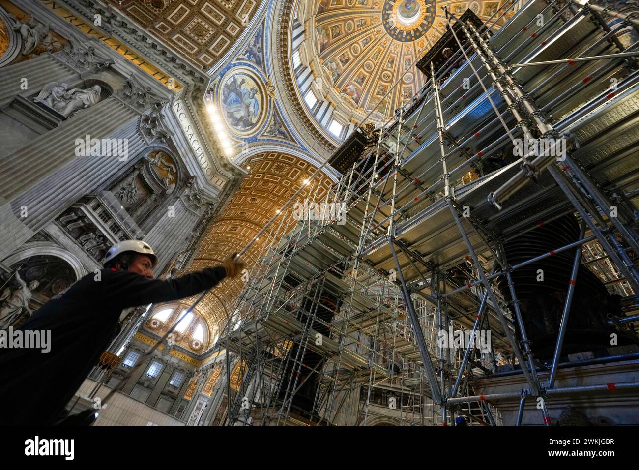 Workmen mount scaffolding around the 17th century, 95ft-tall bronze ...