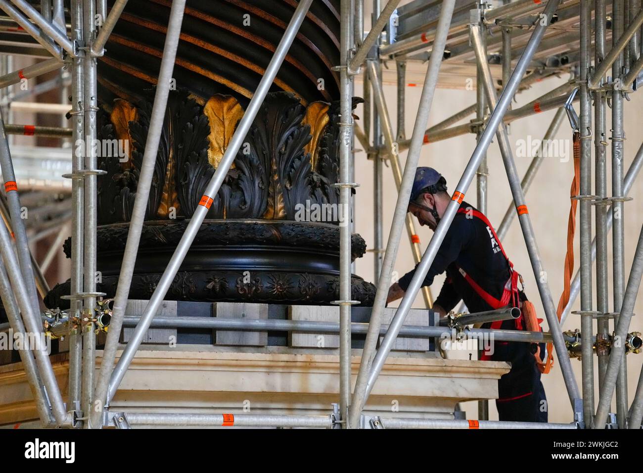 Workmen mount scaffolding around the 17th century, 95ft-tall bronze ...