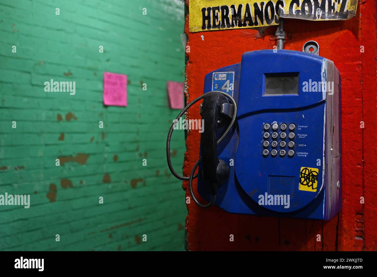 Old landline telephone in a market in the historic centre, Mexico City ...
