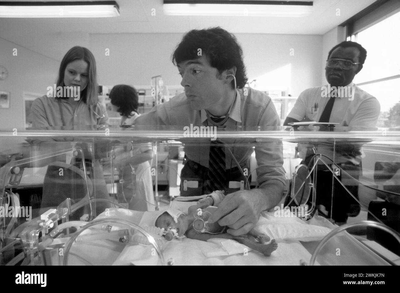Tiny premature baby in hi-res stock photography and images - Alamy