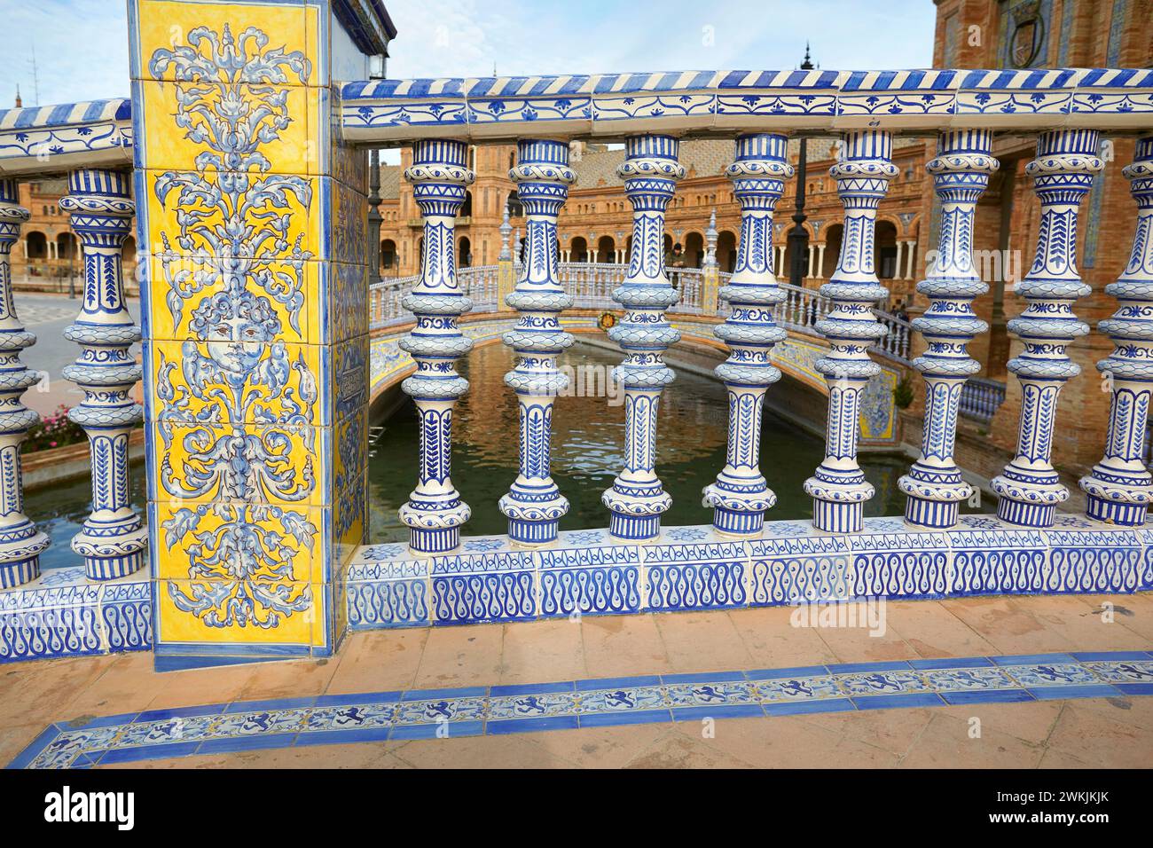 Detail of a decorated ceramic tile bridge in Plaza de Espana, Seville ...