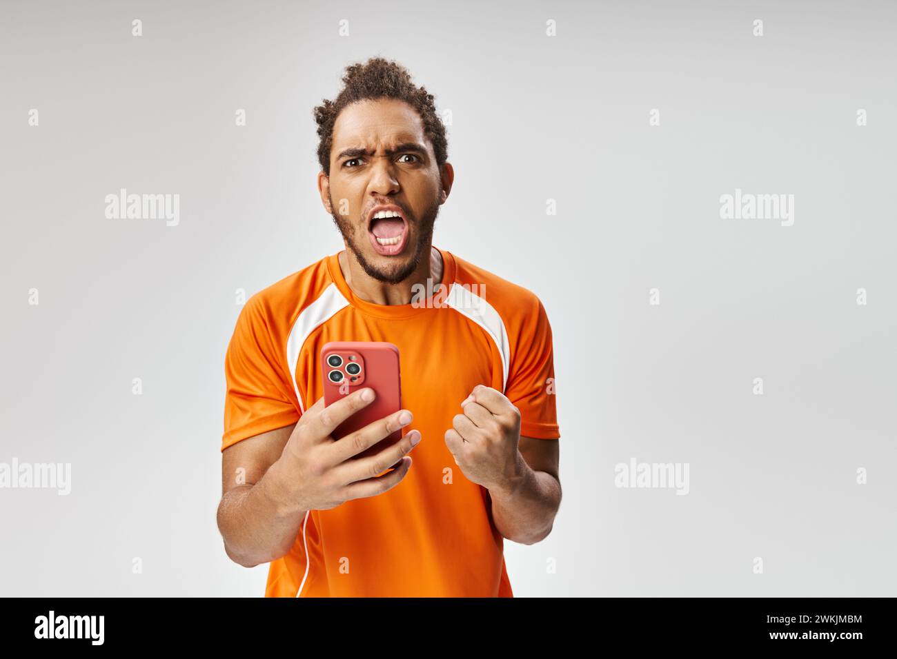 Shocked african american sportsman hi-res stock photography and images ...