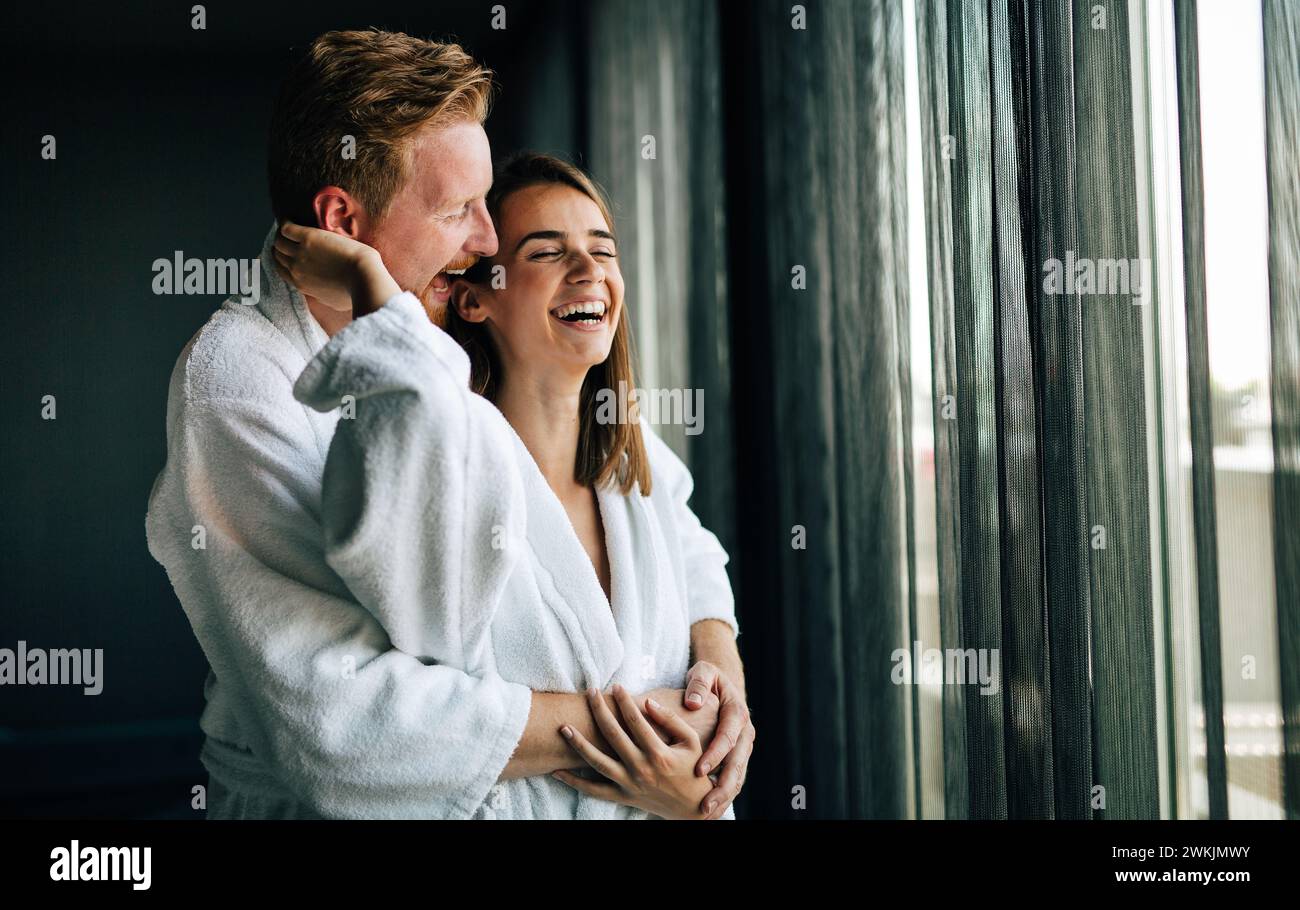 Happy young couple in love enjoying wellness spa resort treatments ...