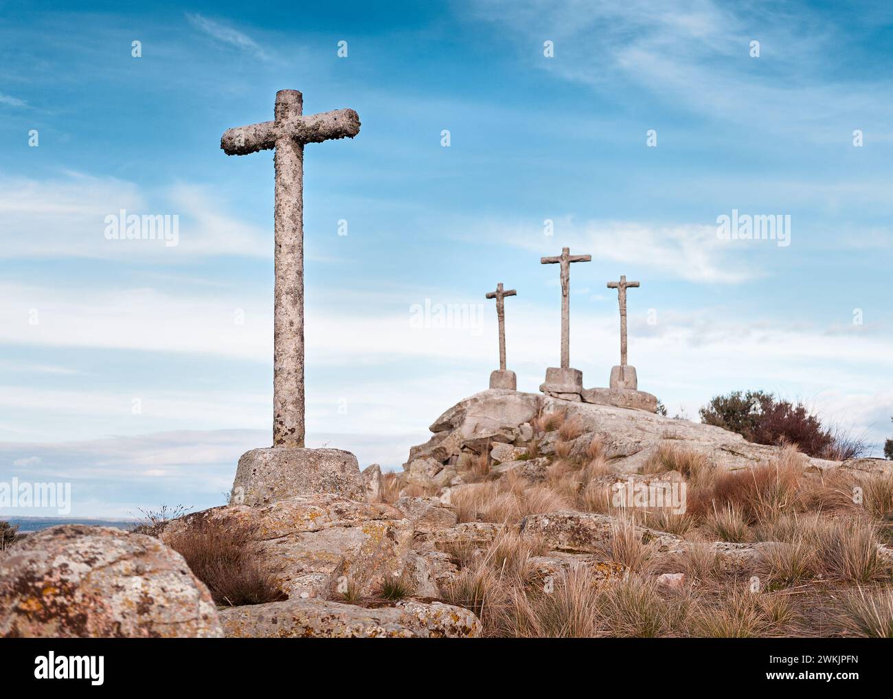 stone cross on dark sky background with Stock Photo - Alamy