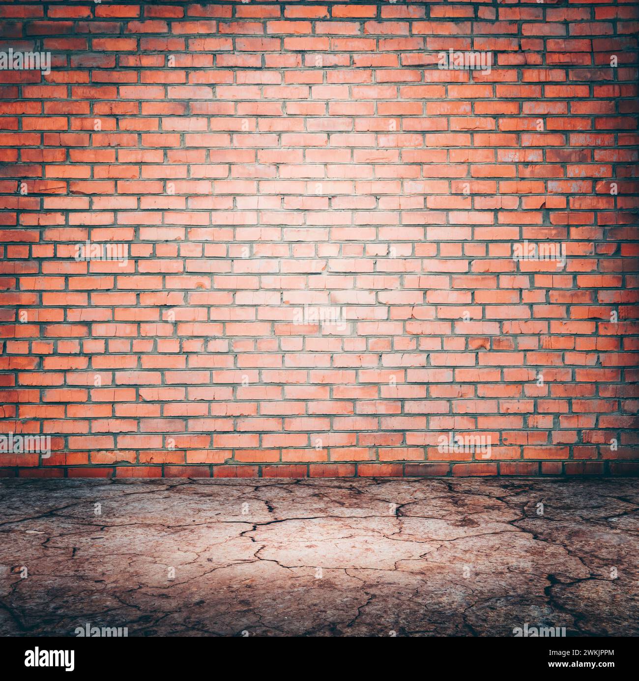 Spotlight on a brick wall. background with brick wall and spotlight ...