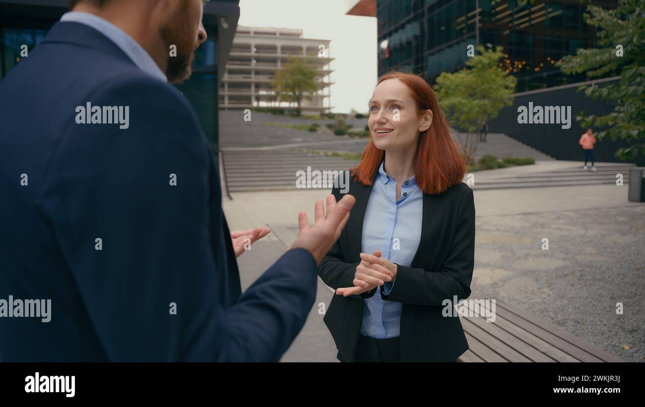 Caucasian businessman and businesswoman coworkers people colleagues ...
