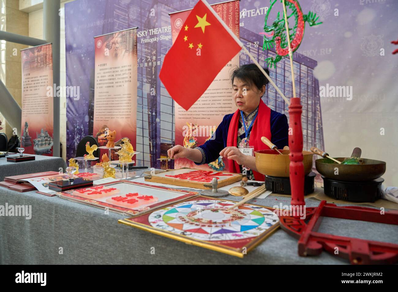 Vladivostok, Russia. 20th Feb, 2024. A Chinese craftswoman makes a ...