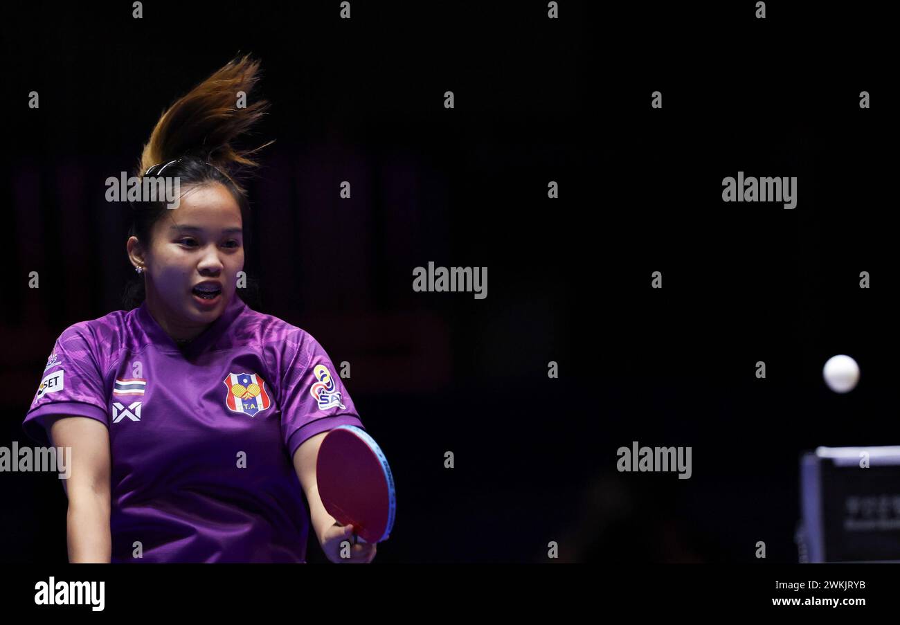 Busan, South Korea. 21st Feb, 2024. Jinnipa Sawettabut of Thailand reacts while competing ...