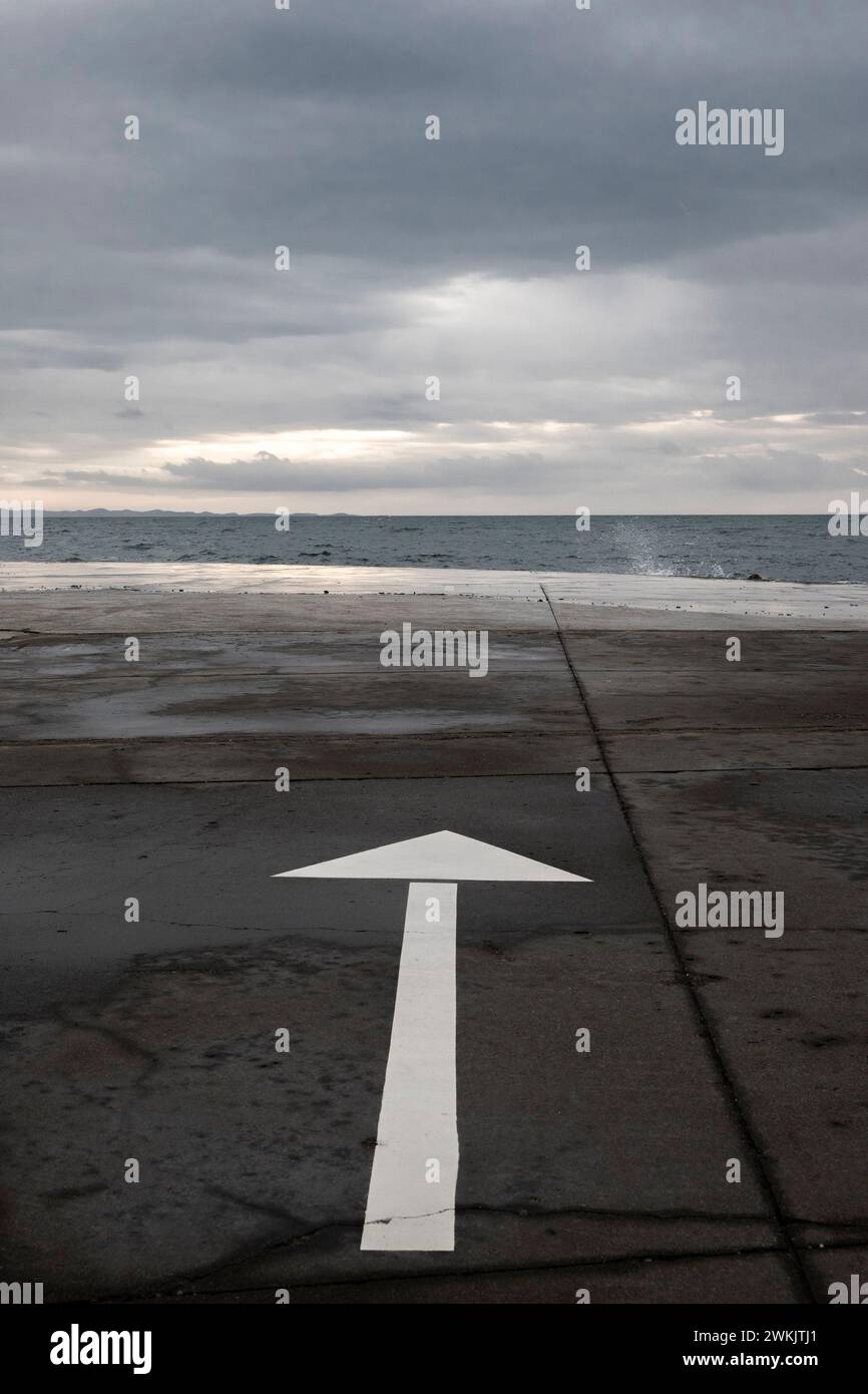 Pavement marking arrow hi-res stock photography and images - Alamy