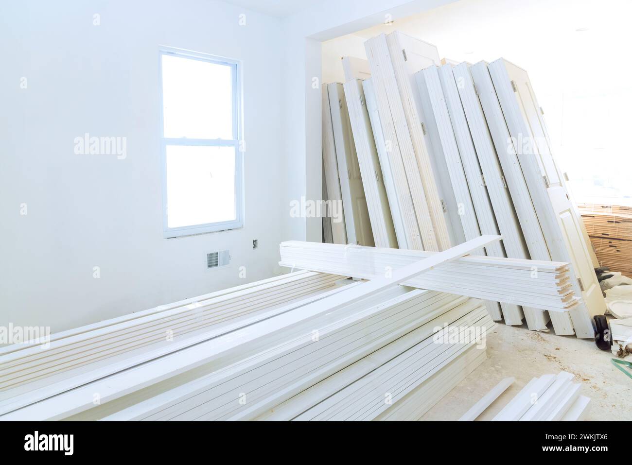 Construction work on interior wooden doors is being prepared for ...