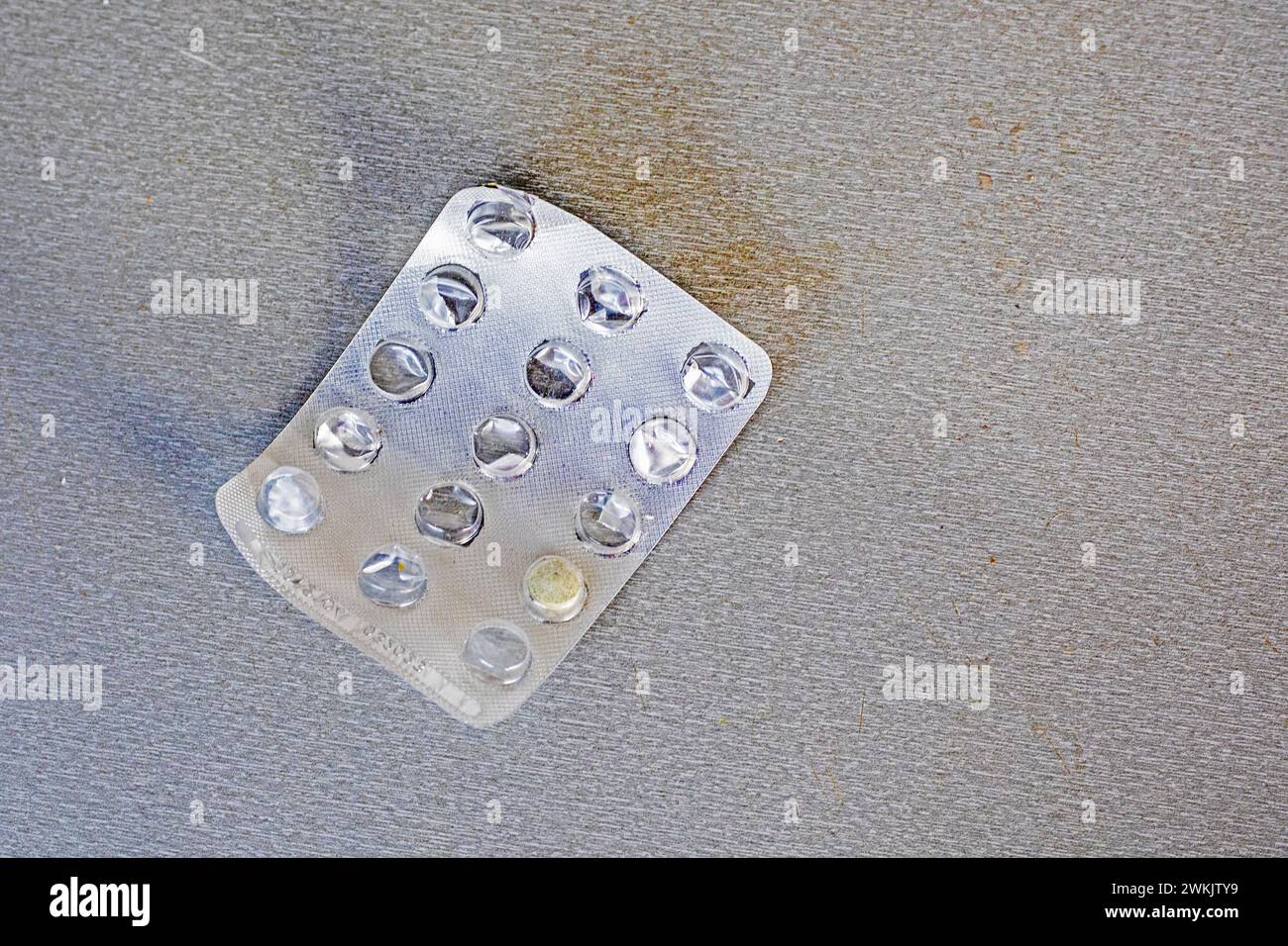 tablets in a blister on the table.Covid 19 and flu illness and health ...