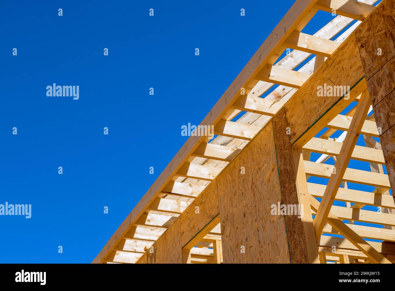 Timber wood stick frame is used to frame beams in newly constructed ...
