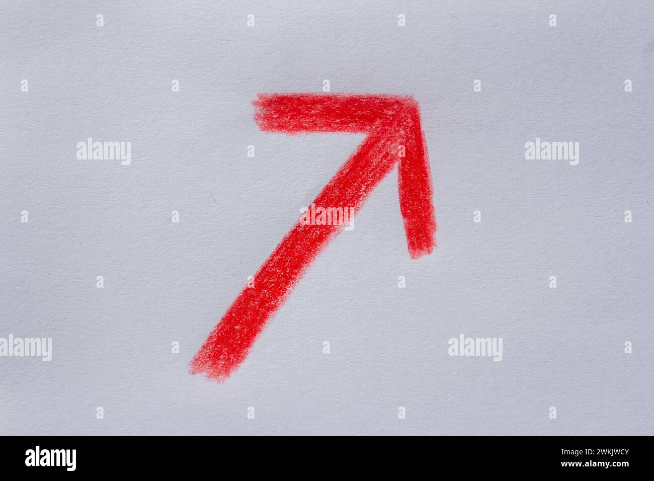 Hand drawn red arrow on white paper Stock Photo - Alamy