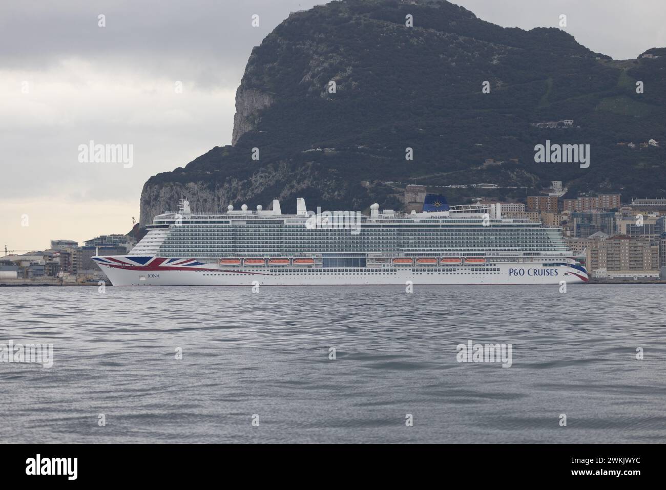 Iona cruise ship docked in front of Gibraltar Rock Stock Photo - Alamy