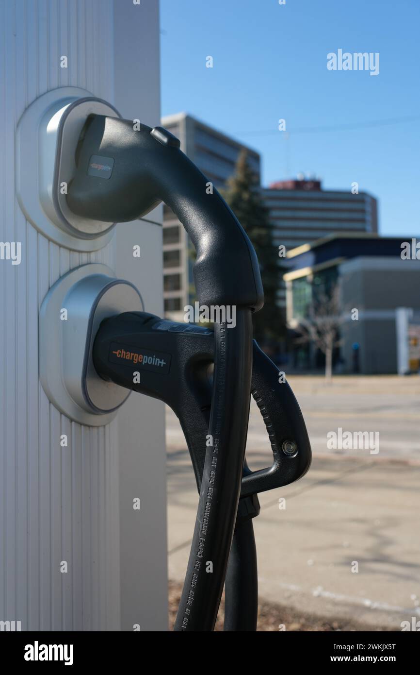 Plugs on a ChargePoint electric vehicle public charge station EV ...