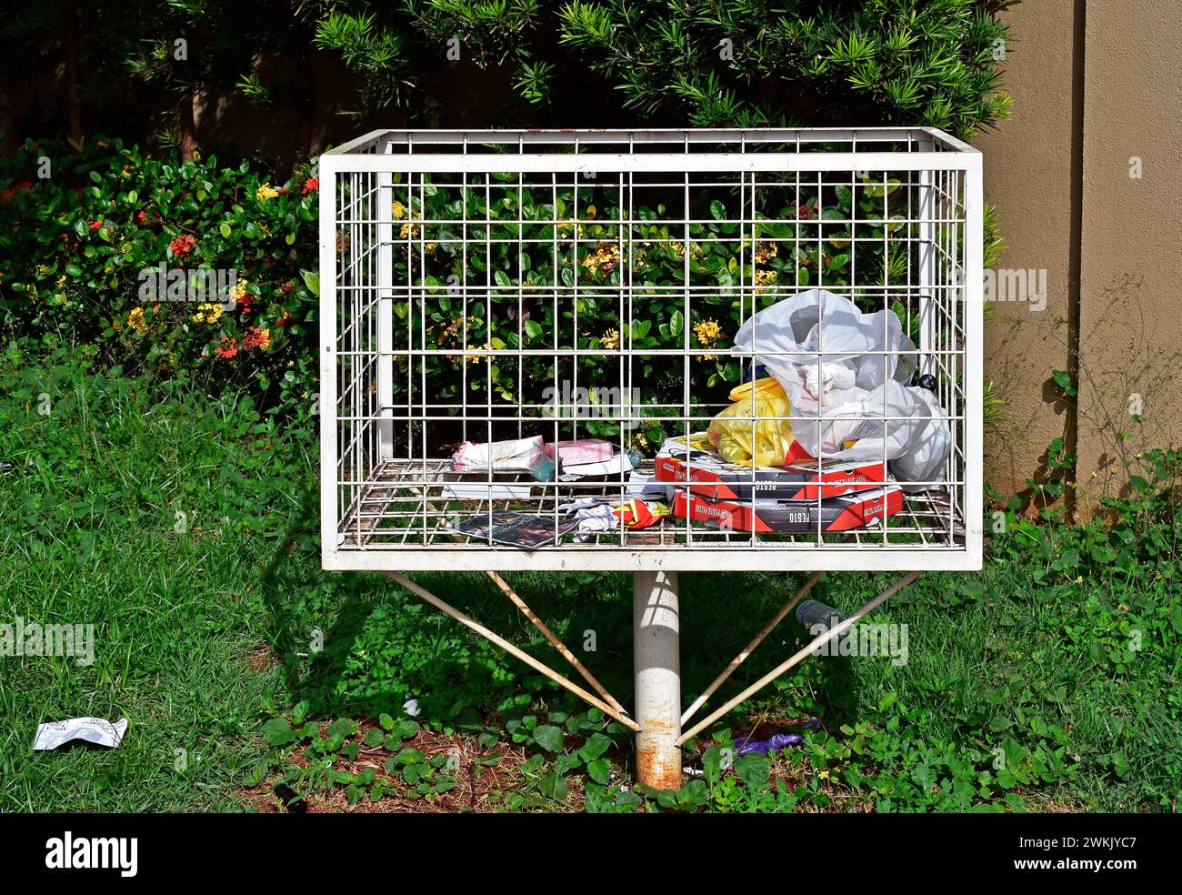 RIBEIRAO PRETO, SAO PAULO, BRAZIL - January 2, 2024: Grid trash can on ...