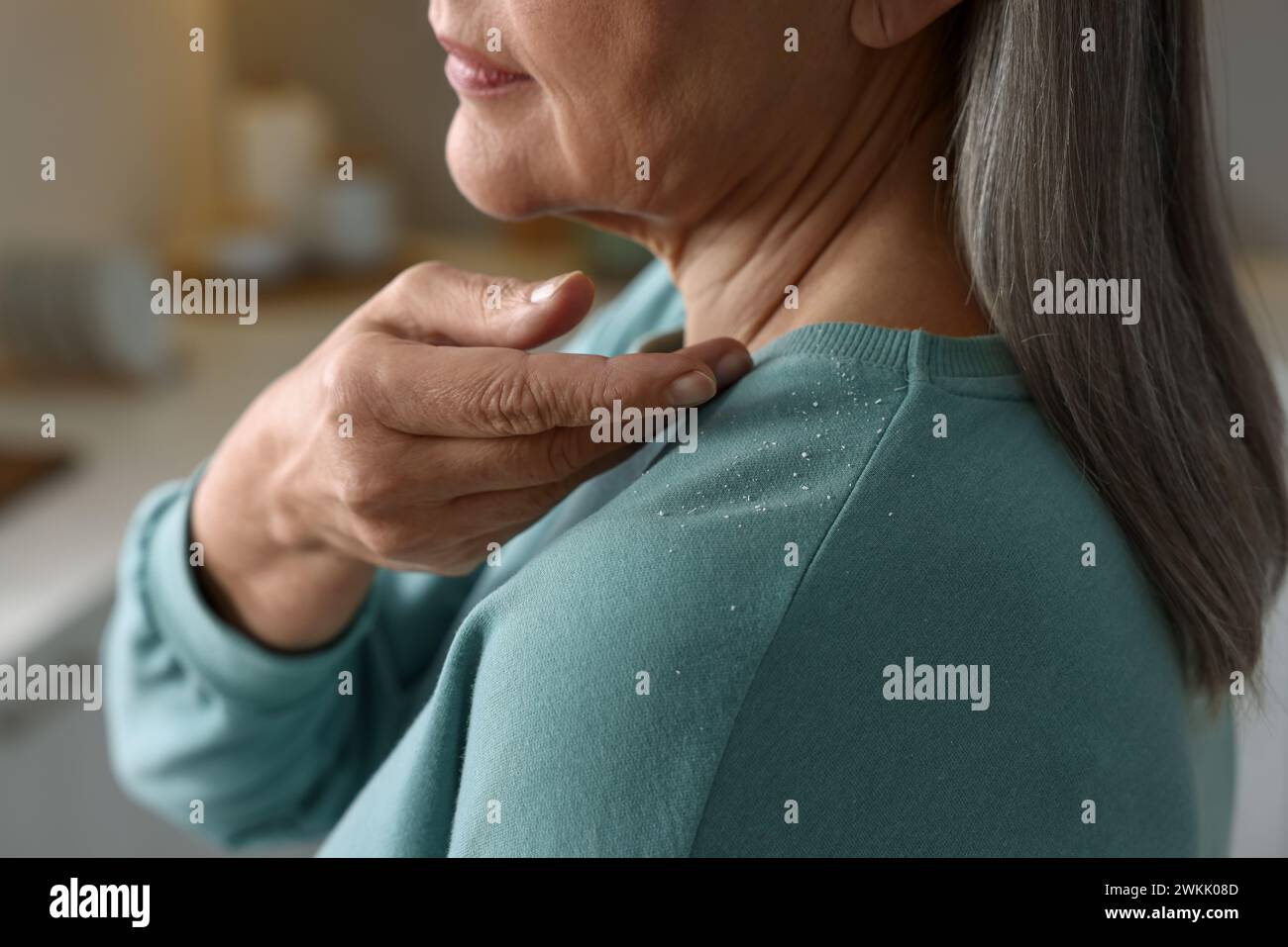 Woman brushing off skin hi-res stock photography and images - Alamy