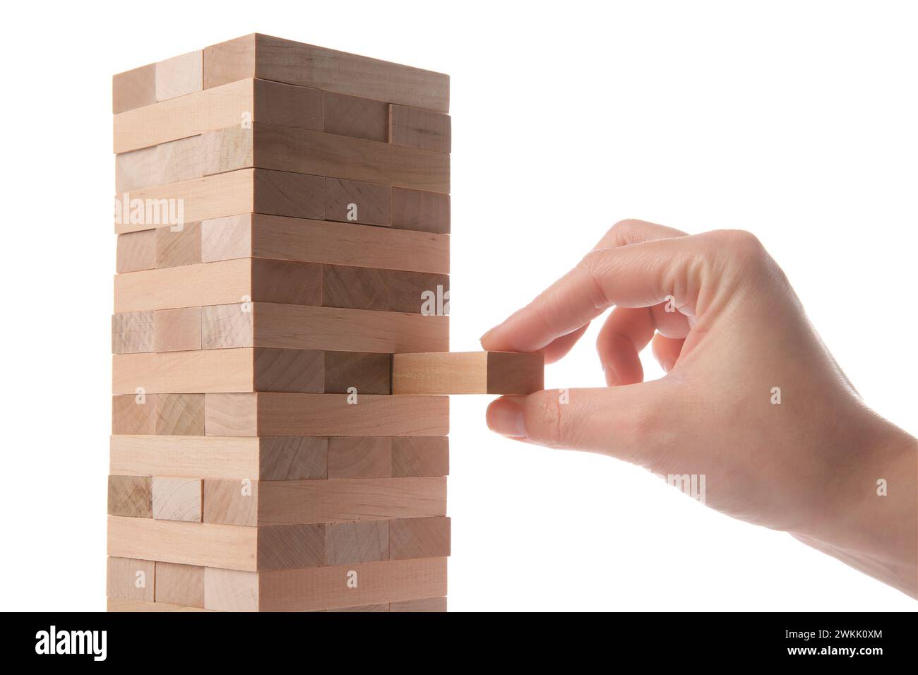 Woman playing Jenga on white background, closeup Stock Photo - Alamy