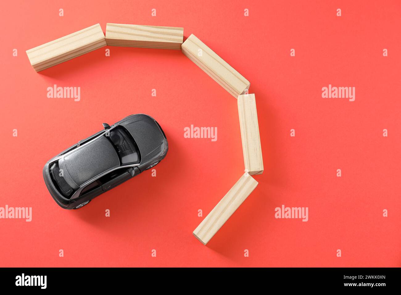 Development through barriers overcoming. Silver toy car movement ...