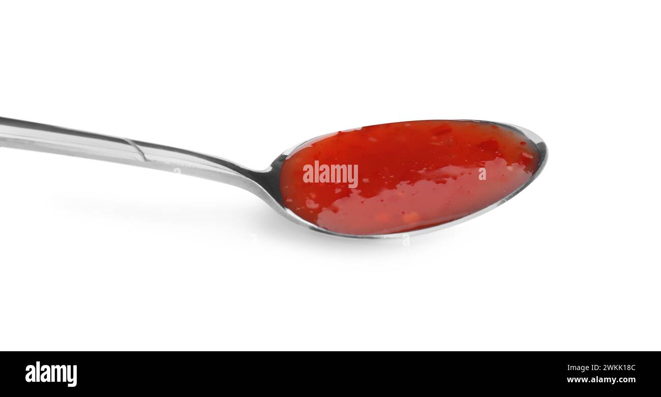 Spicy chili sauce in spoon isolated on white Stock Photo - Alamy